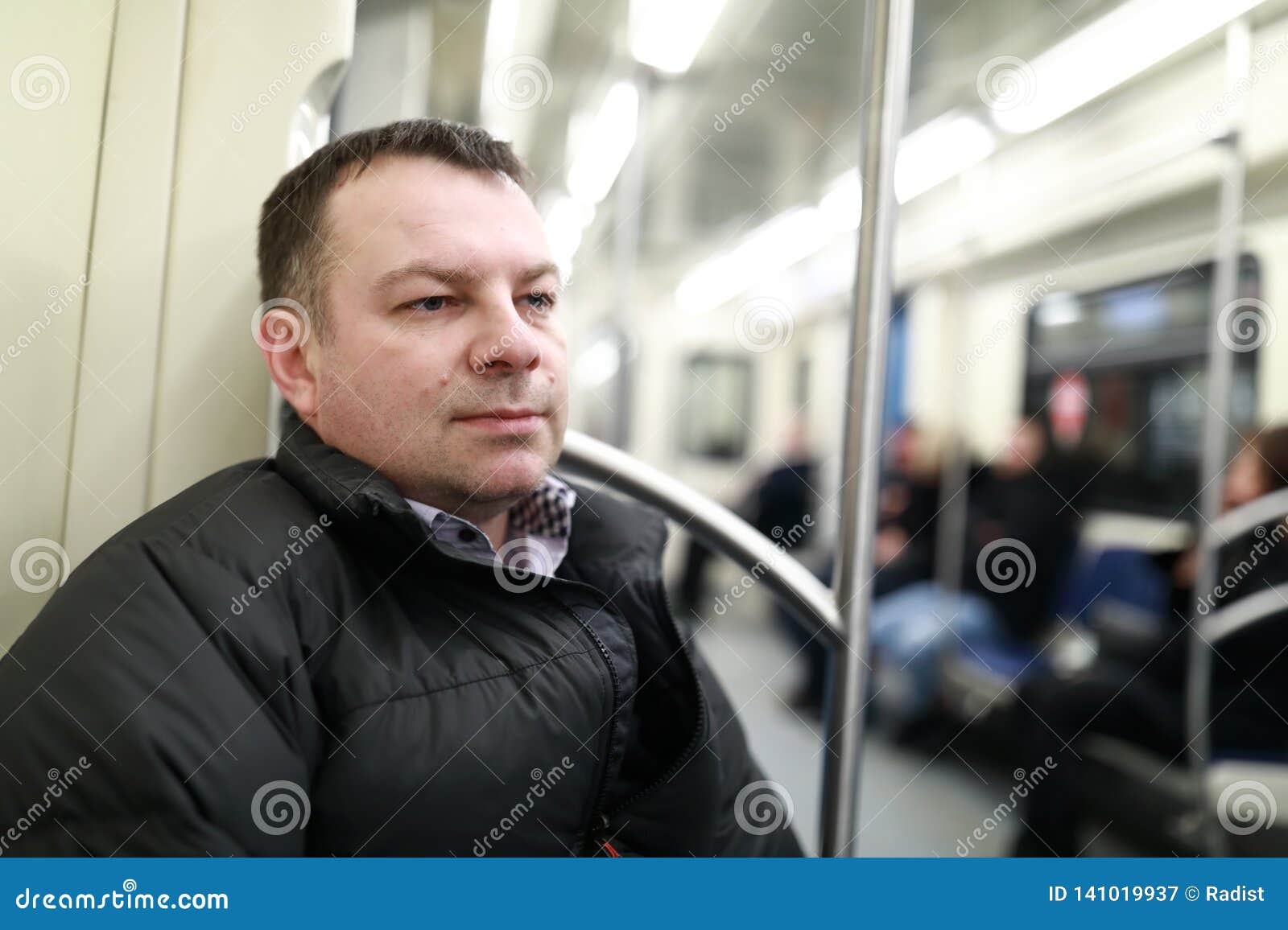 Man in subway train stock image. Image of person, crowd - 141019937