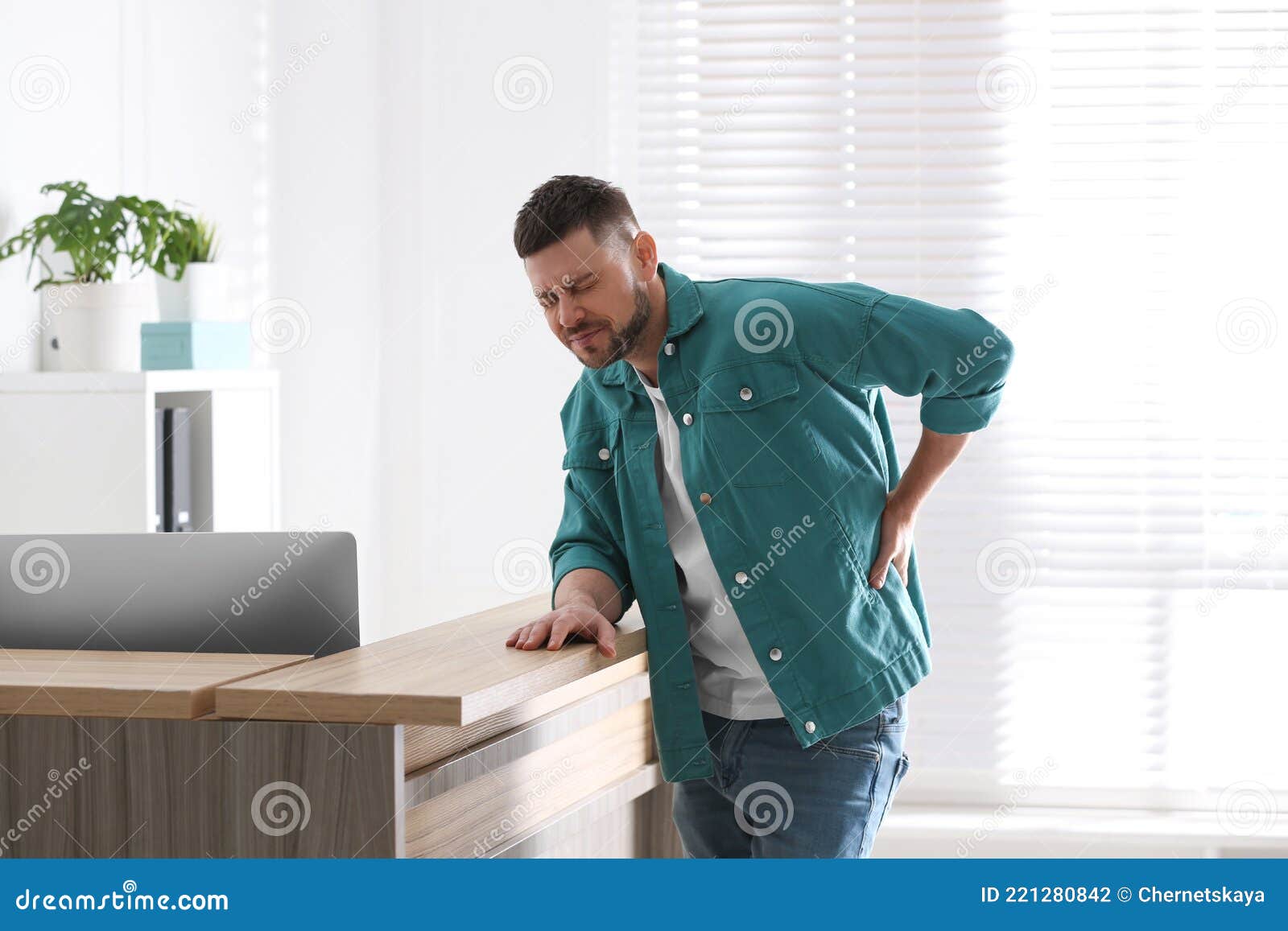 Man Suffering from Back Pain in Office. Bad Posture Stock Photo - Image ...