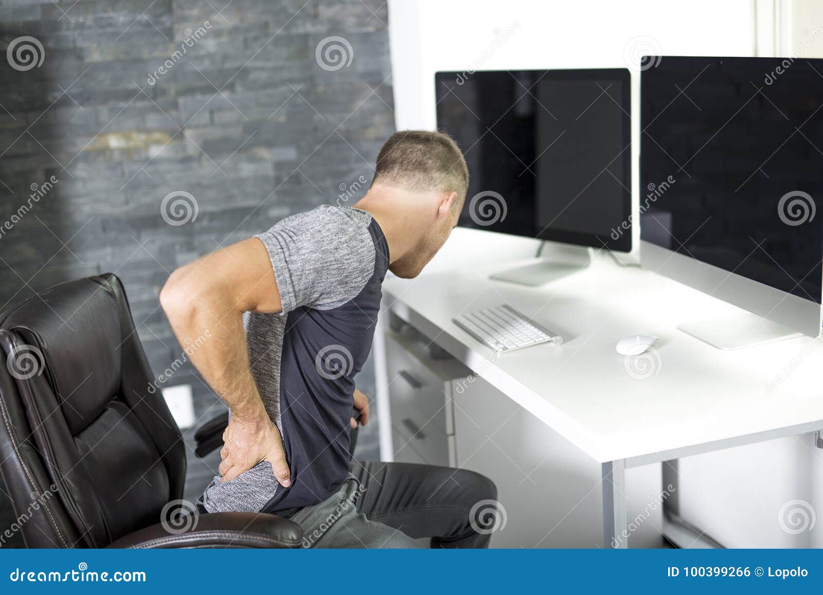 Man Suffering from Backache while Sitting at Computer Desk in Office ...
