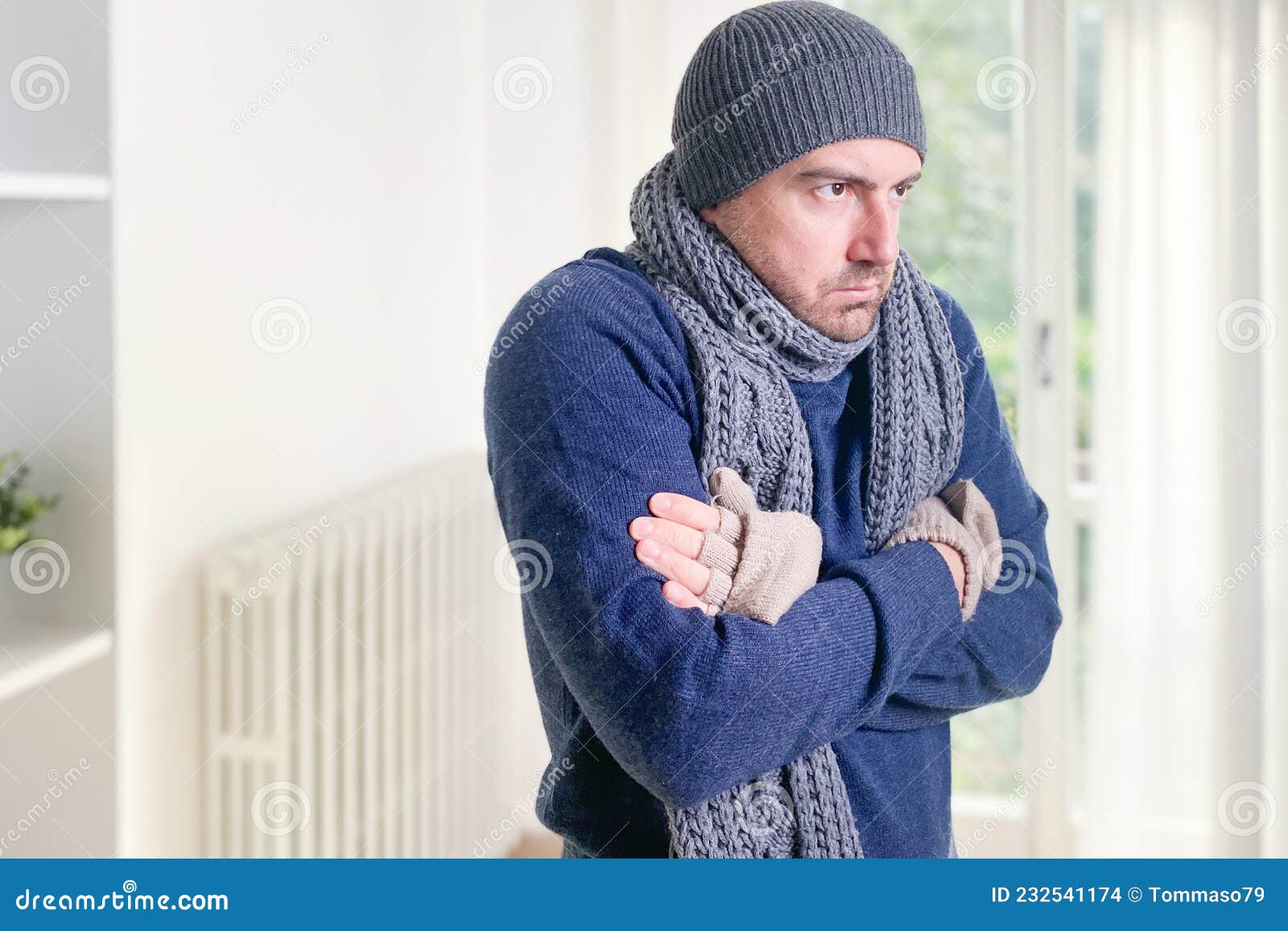 Man Suffering Cold at Home and Problem with House Heating Stock Photo ...
