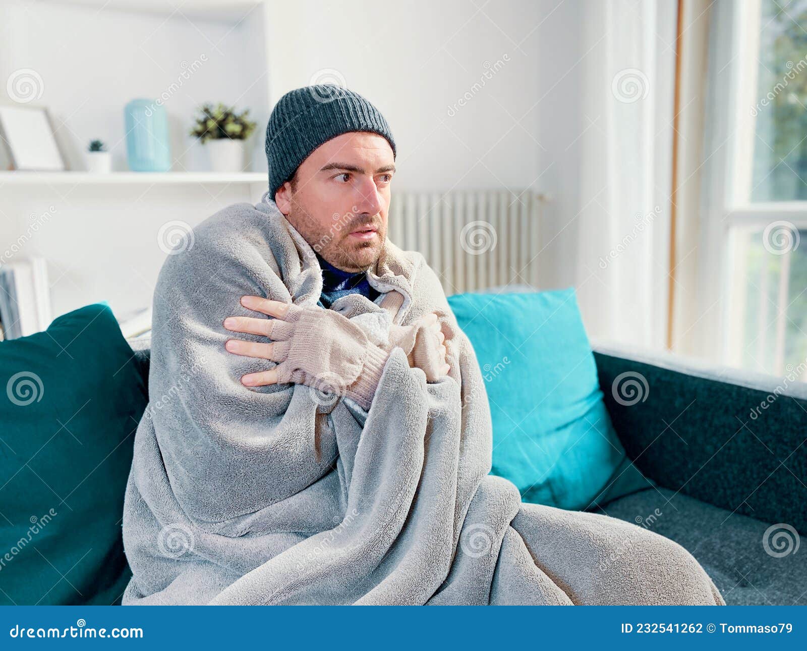 Man Suffering Cold at Home and Problem with House Heating Stock Photo ...