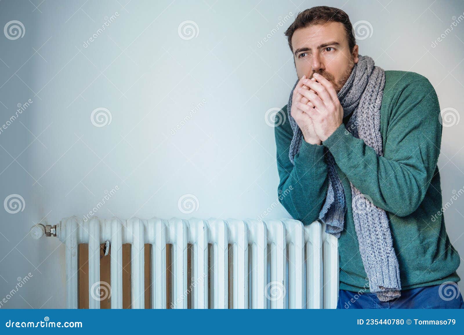 Man Suffering Cold at Home and Problem with House Heating Stock Photo ...