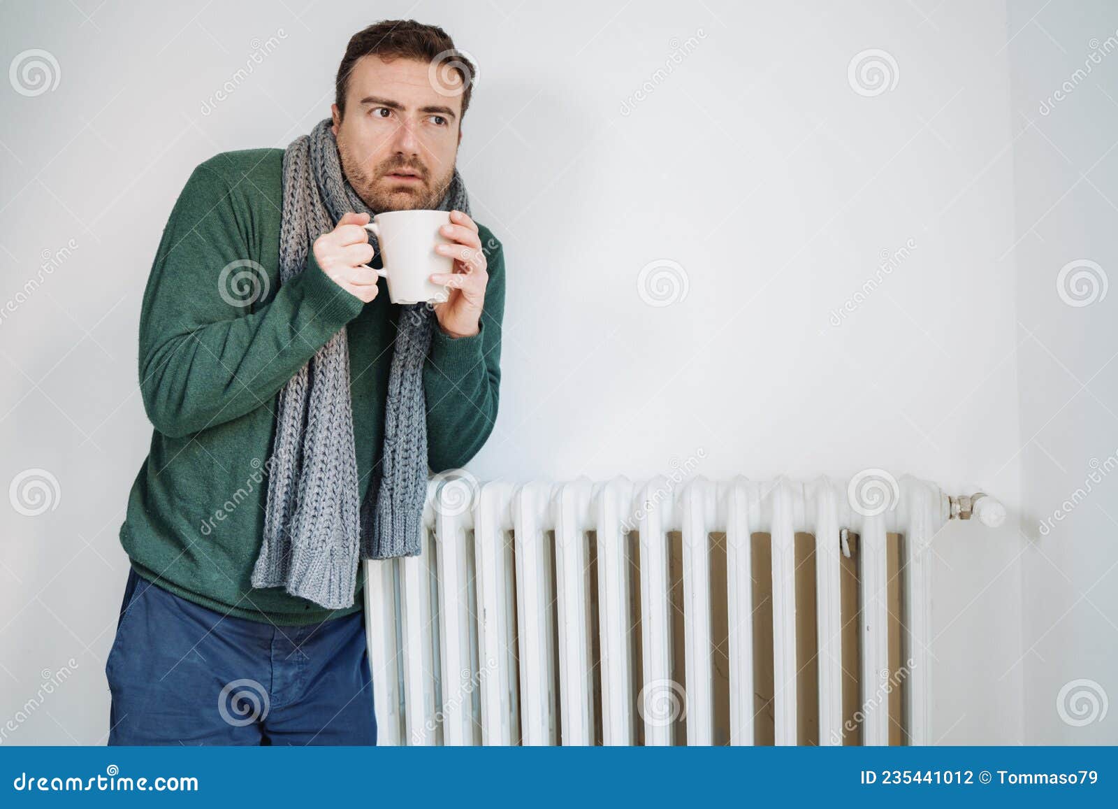 Man Suffering Cold at Home and Problem with House Heating Stock Photo ...