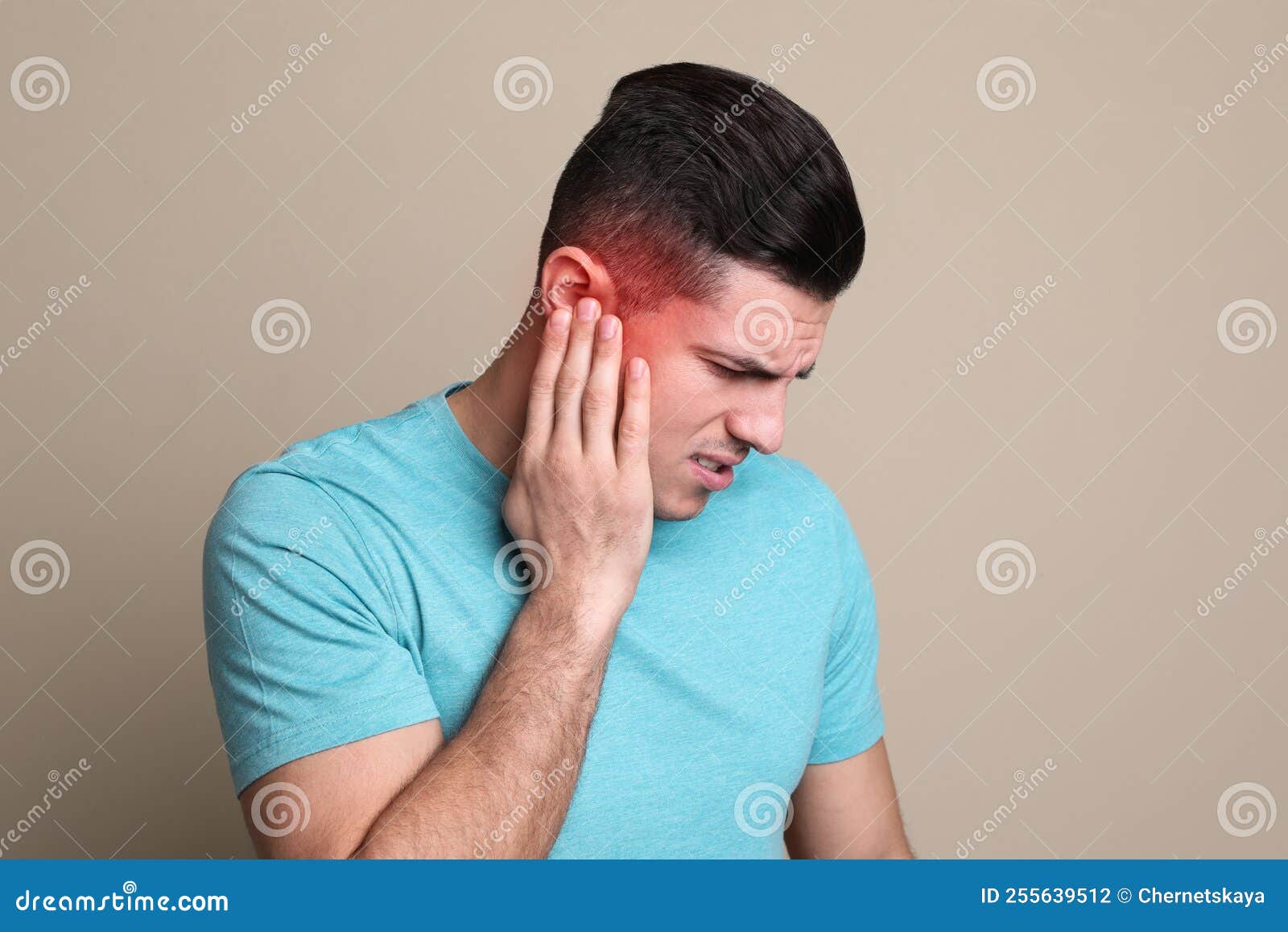 Man Suffering from Ear Pain on Beige Background Stock Photo - Image of ...