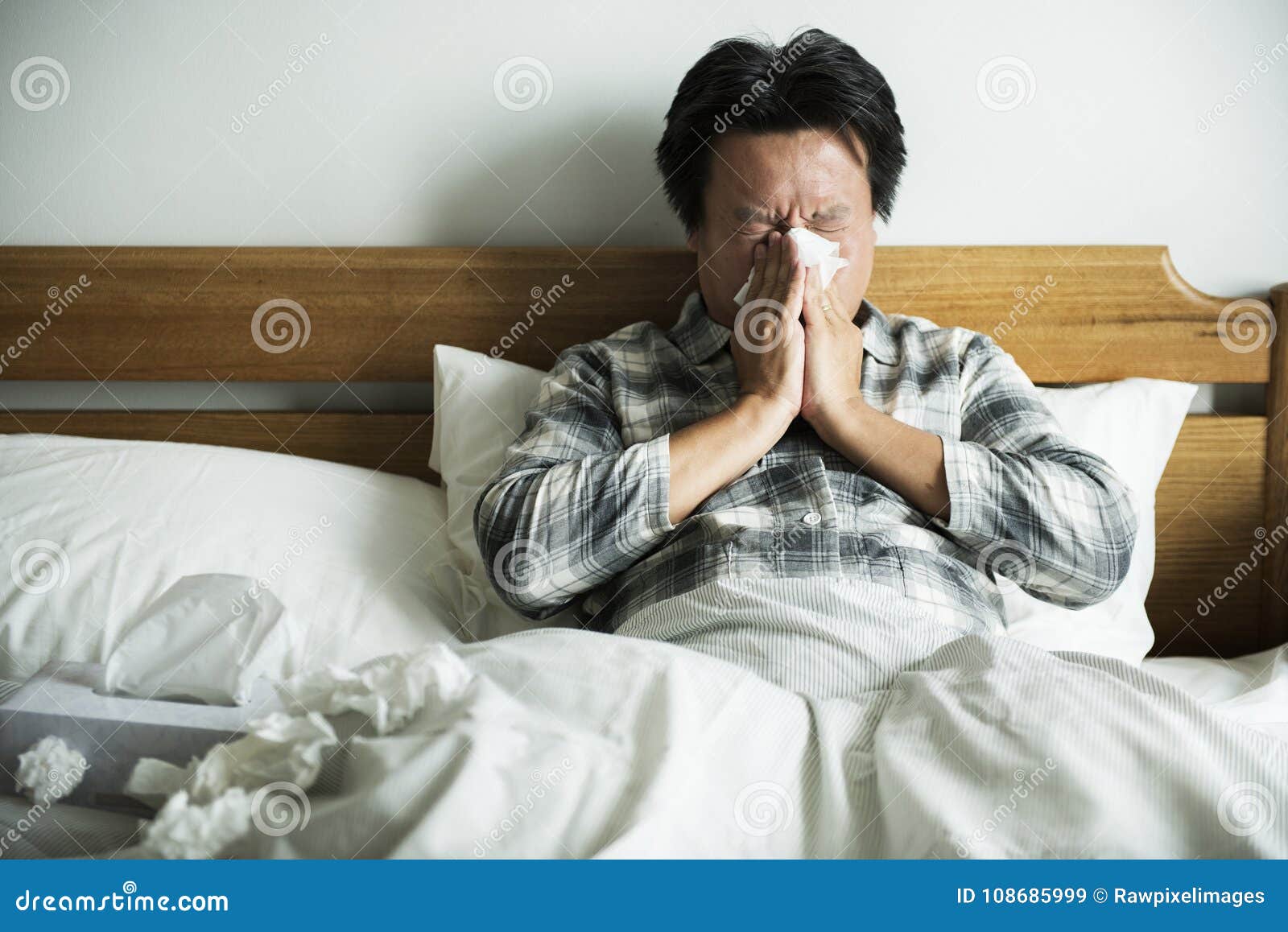 A Man Suffering from Flu Sitting in Bed Stock Image - Image of home ...