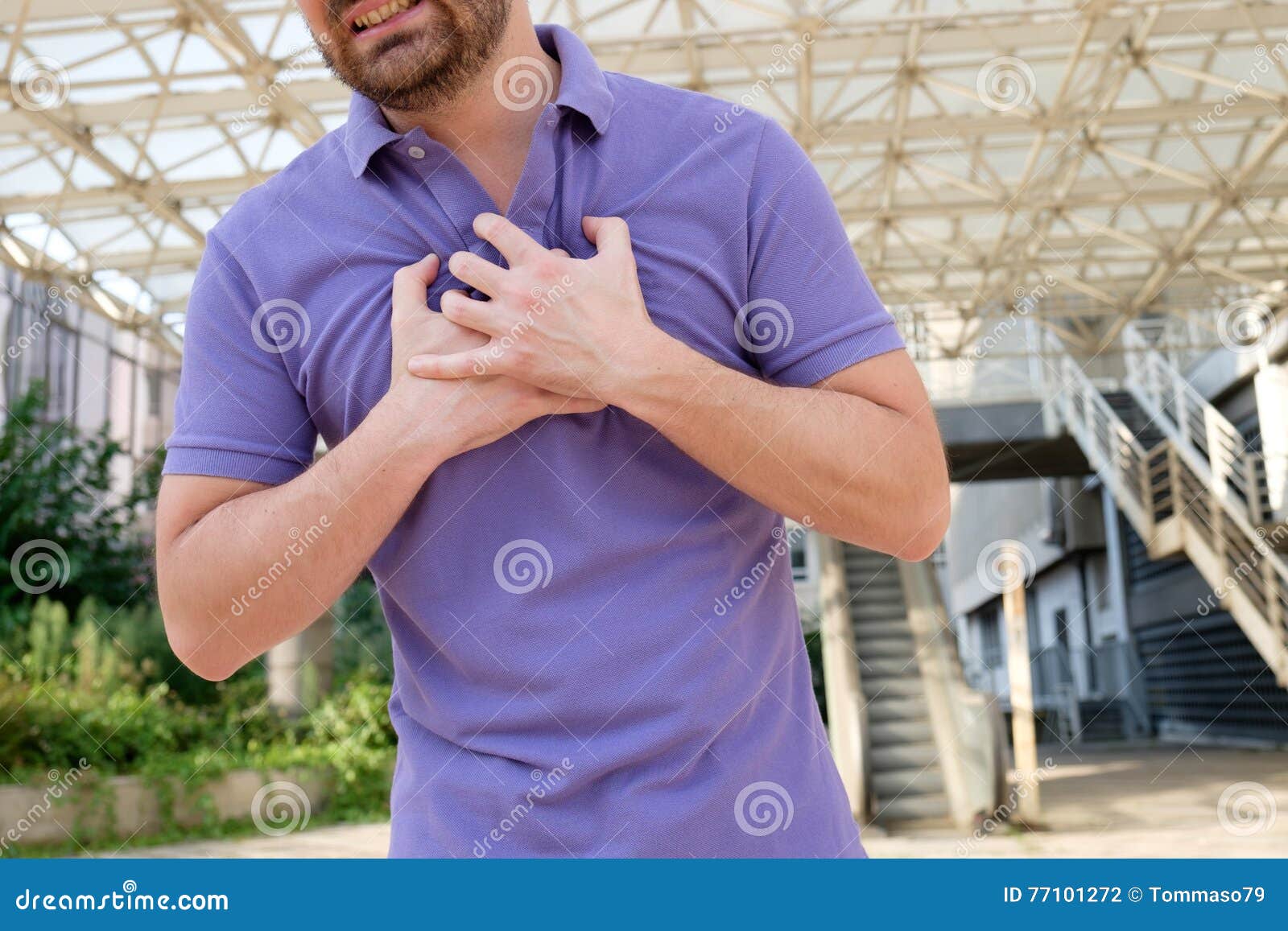 Man Suffering for Heart Attack Stock Photo - Image of hand, medical ...