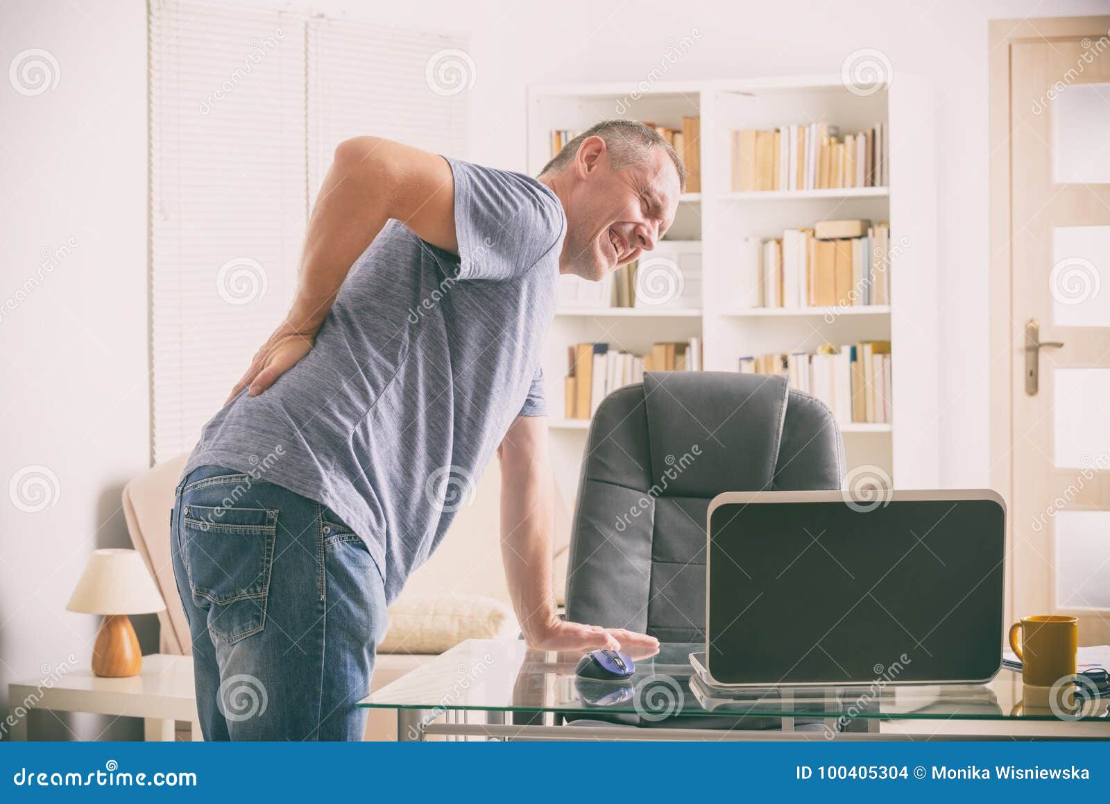 Man Suffering from Low Back Pain Stock Photo - Image of desk ...