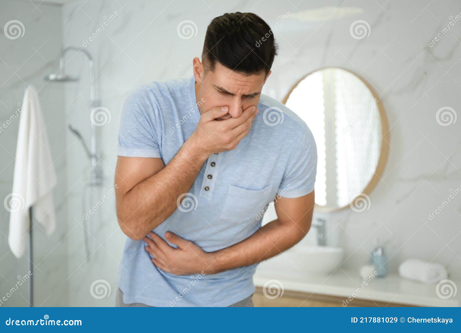 Man Suffering from Nausea in Bathroom. Food Poisoning Stock Image ...