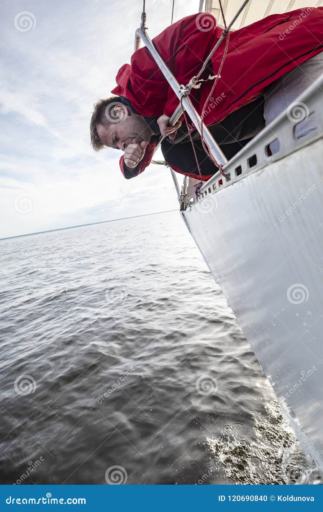 A Man Suffers from Seasickness while Walking on a Yacht. Stock Photo ...