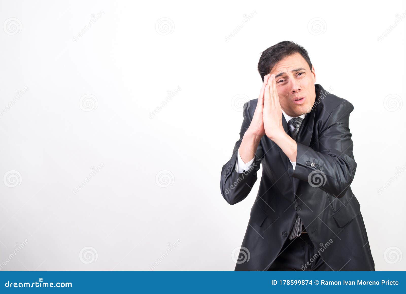Man in suit begging stock photo. Image of formal, confident - 178599874