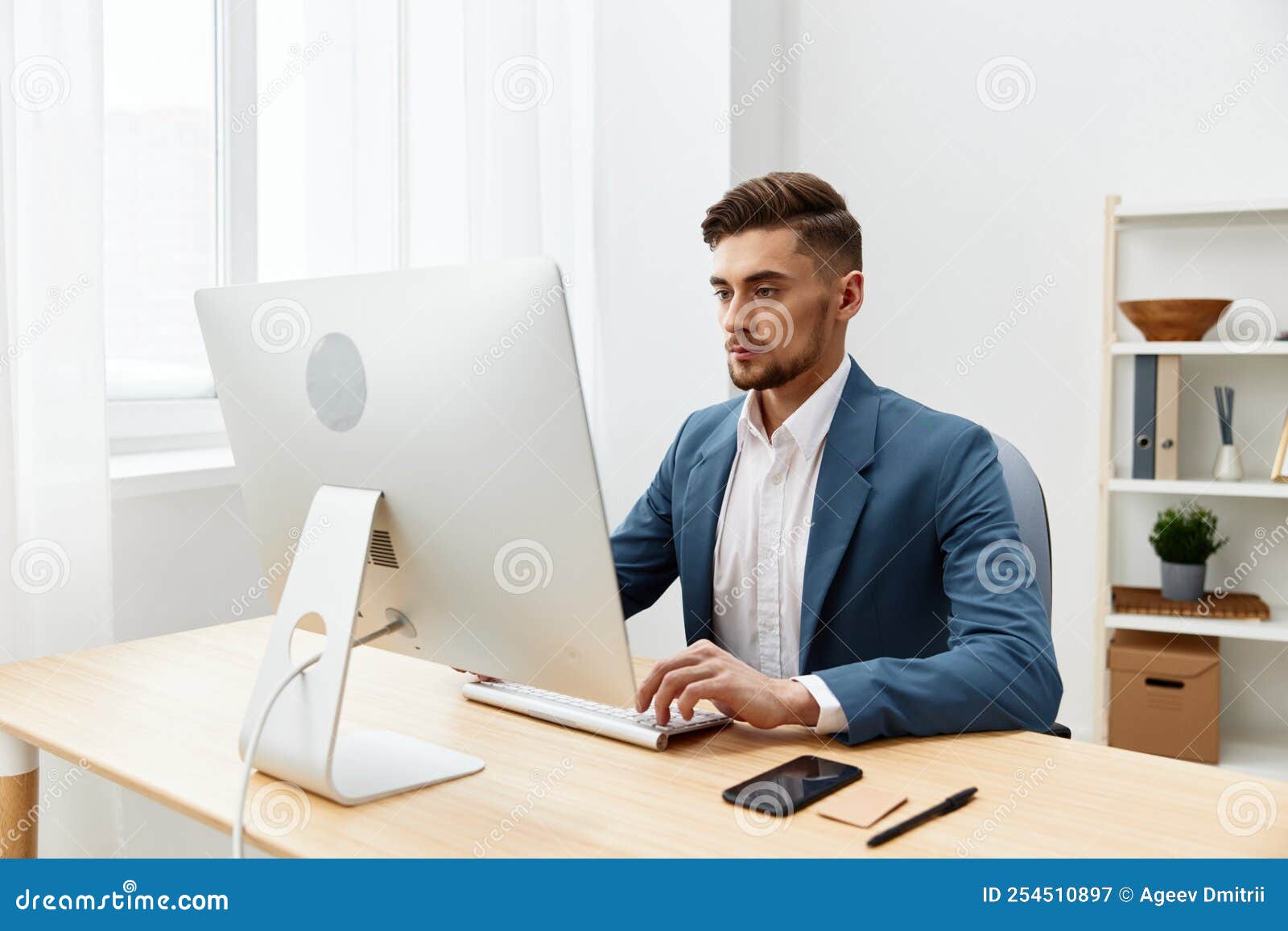 A Man in a Suit Computer Desktop Work Self-confidence Executive Stock ...