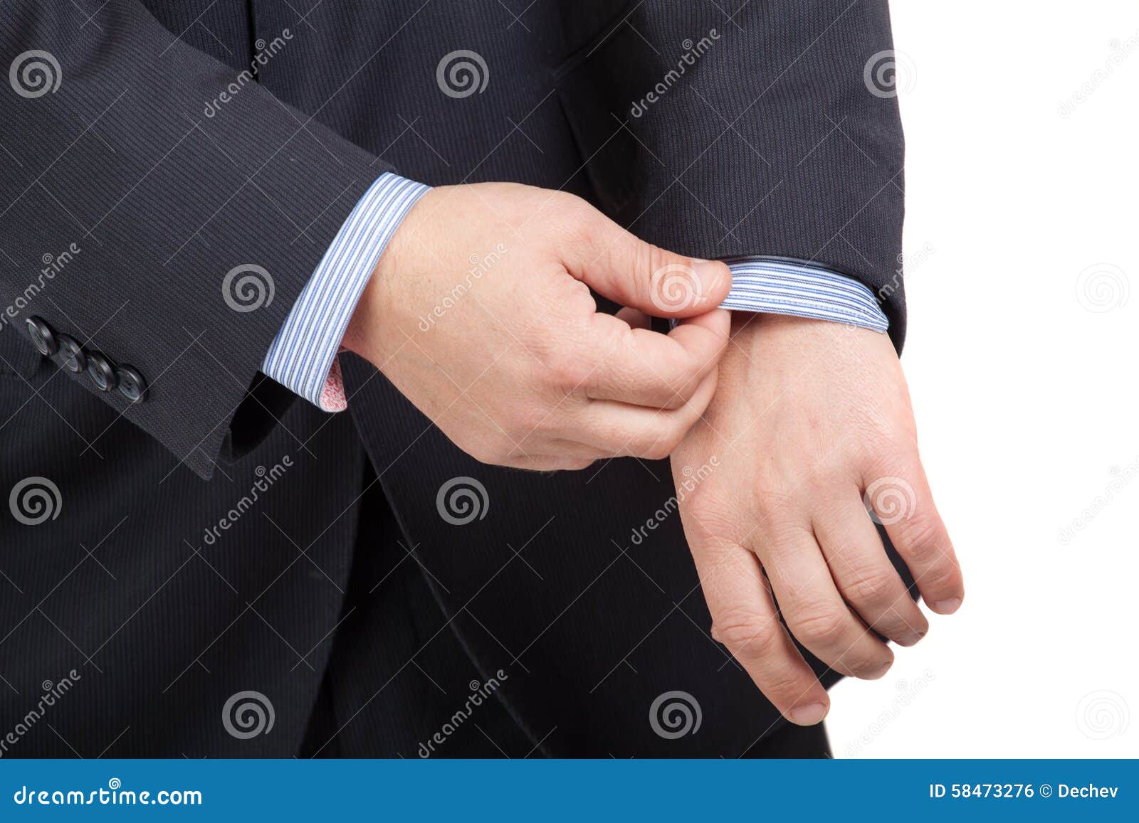Man in Suit Correcting a Sleeve Stock Photo - Image of sleeve, groom ...