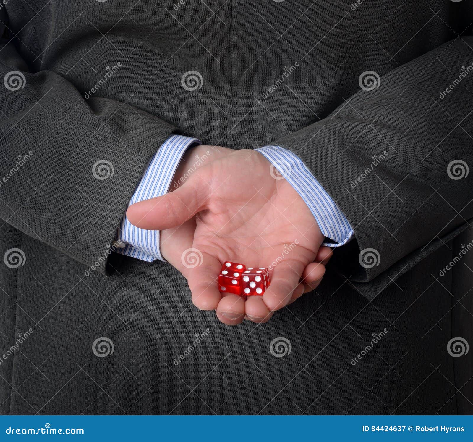 Man in Suit with Dice Behind His Back Stock Image - Image of cheat ...