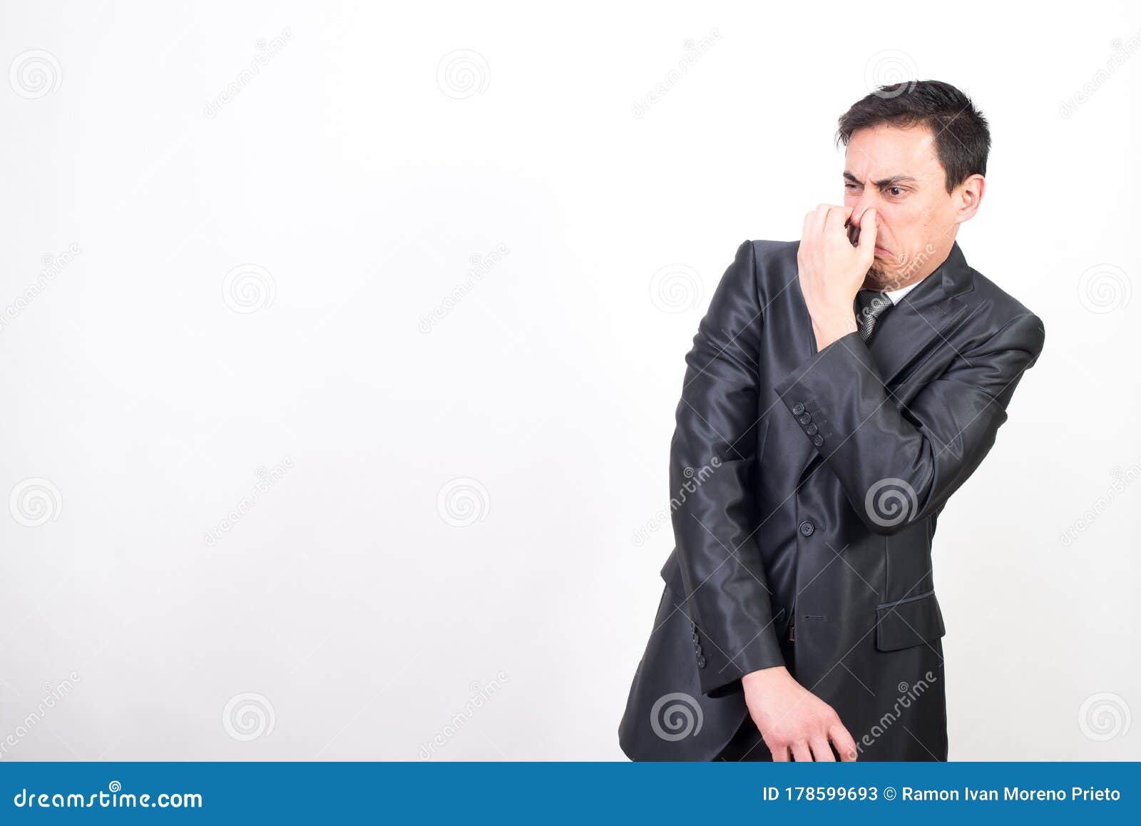 Man in Suit Disgusted by Bad Smell Stock Image - Image of white ...