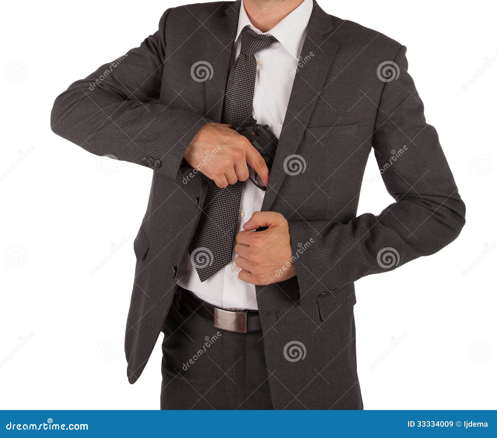 Man in a suit grabbing gun stock image. Image of hand - 33334009