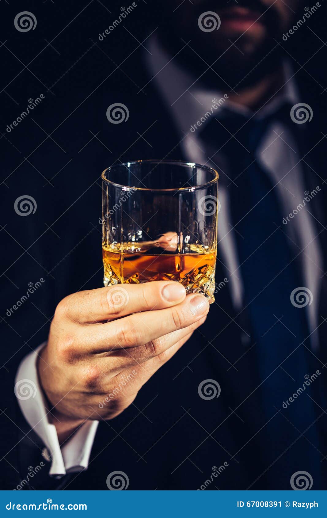 Man in Suit Holding a Glass of Alcohol Stock Image - Image of drink ...