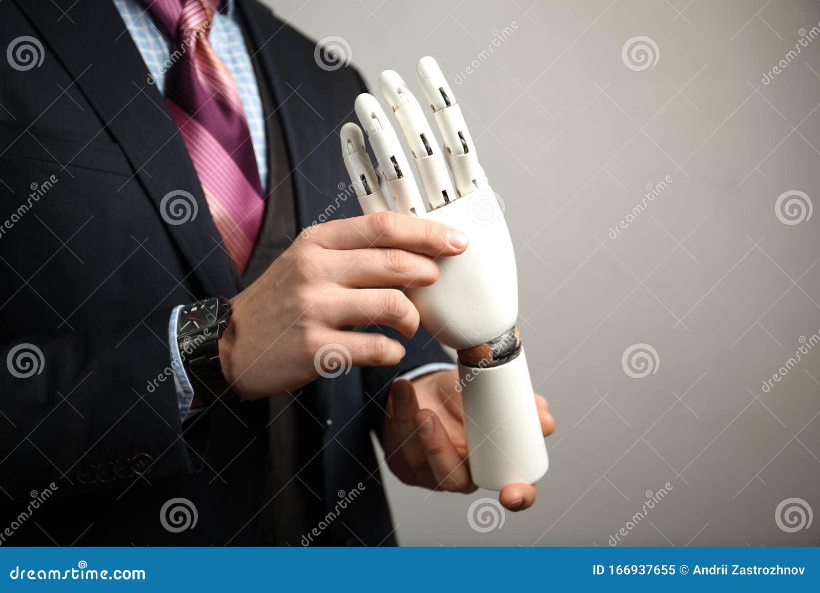 Man in Suit Holding Prosthesis Artificial Man`s Hands Stock Image ...