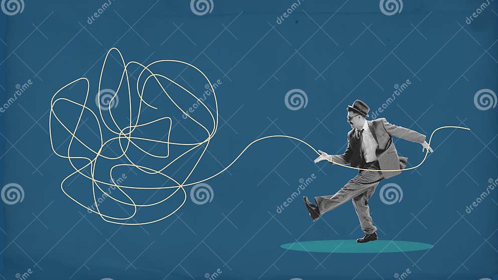 Man in Suit Holding Tangled String, Symbolizing Untangling Complexities ...