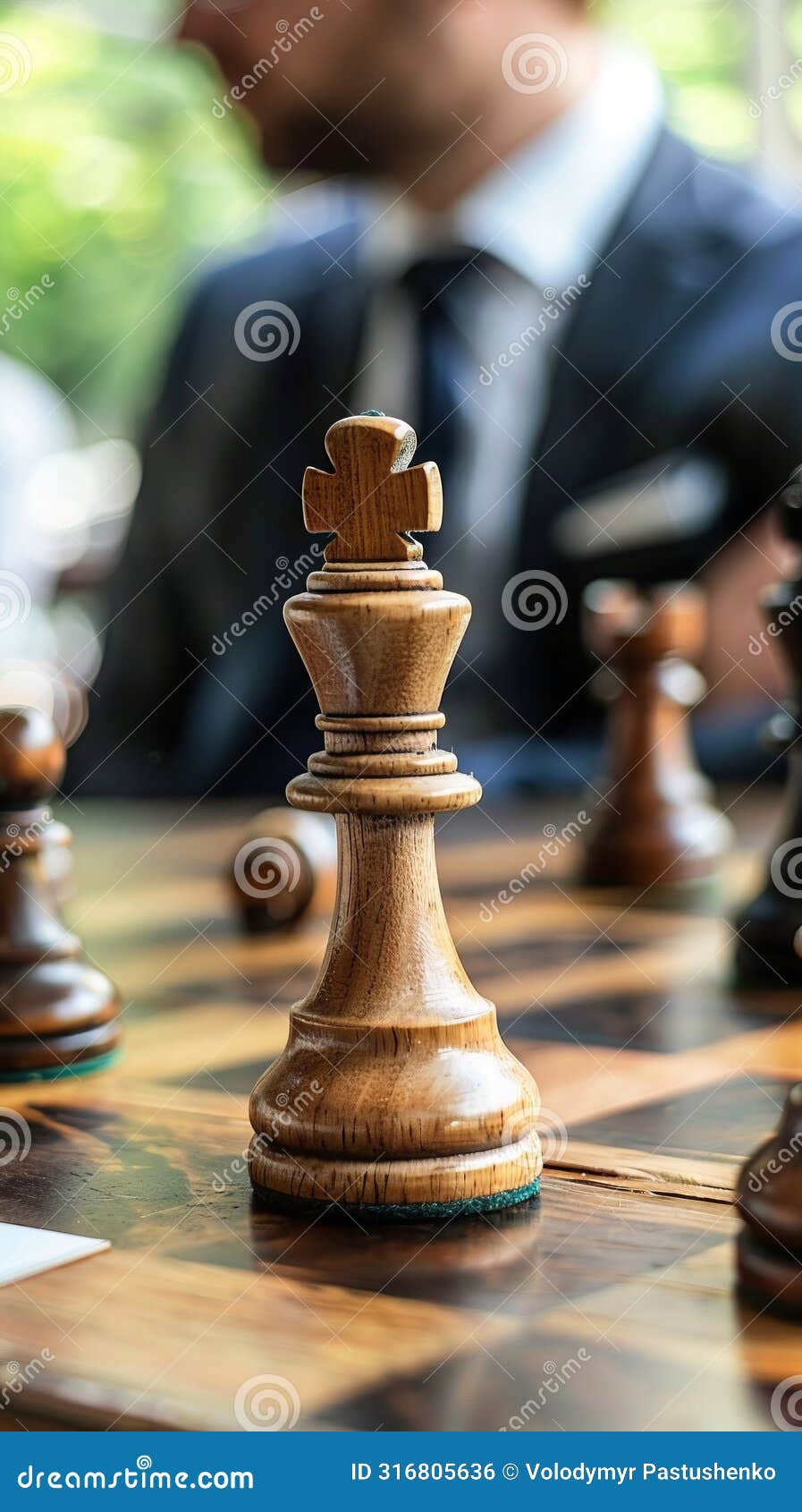 A Man in a Suit is Playing Chess Stock Photo - Image of indoor ...