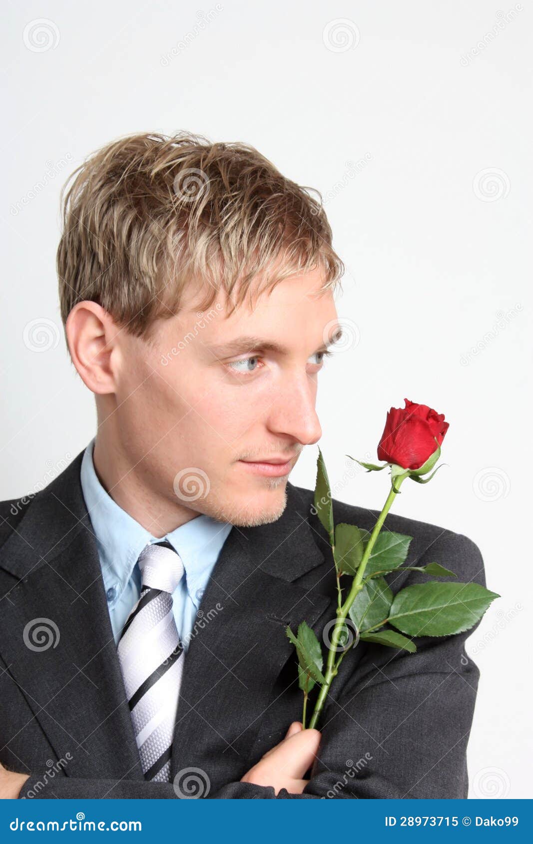 Man in suit with red rose stock image. Image of confidence - 28973715