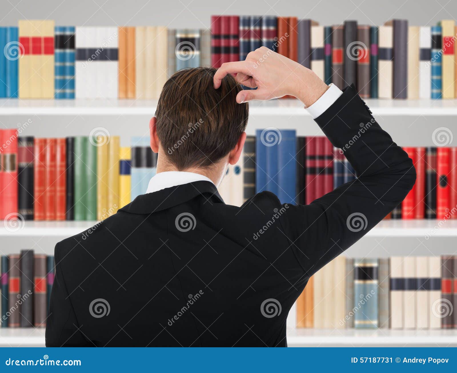 Man in a Suit Scratching His Head Stock Image - Image of arrangement ...