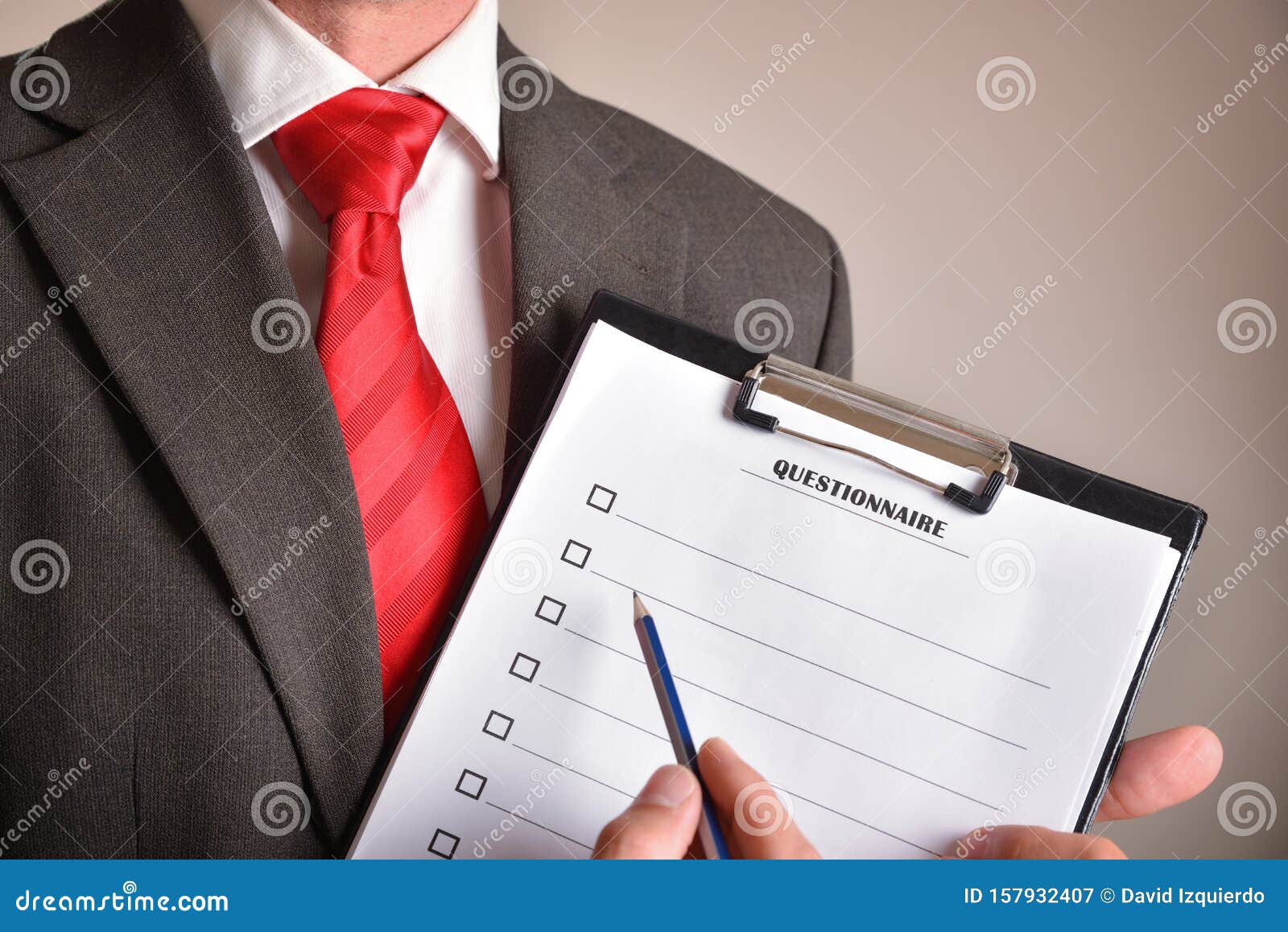 Man in Suit Showing a Questionnaire Front View Stock Image - Image of ...