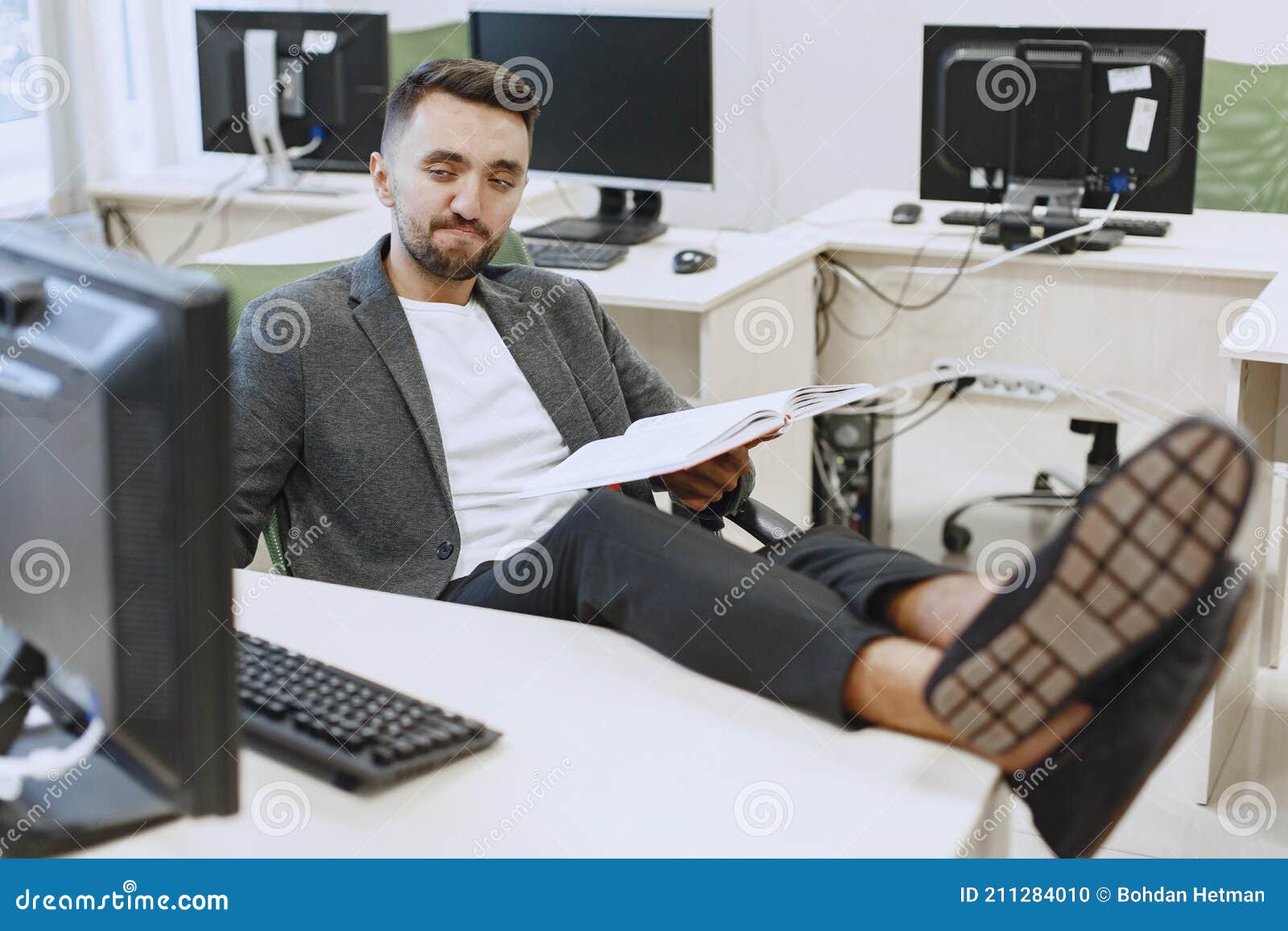 Man in a Suit is Sitting at the Computer. Stock Photo - Image of male ...