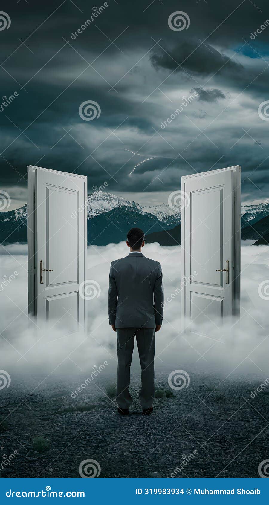 Man in Suit Stands Facing Open Doors in Cloudy Landscape with Mountain ...