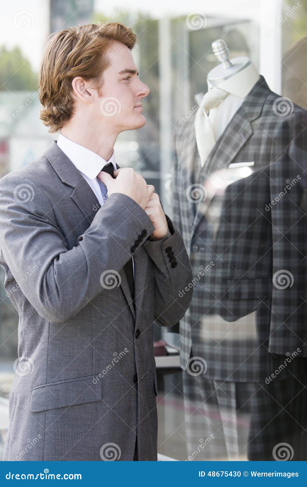 Man in Suit at a Storefront Stock Photo - Image of design, outside ...