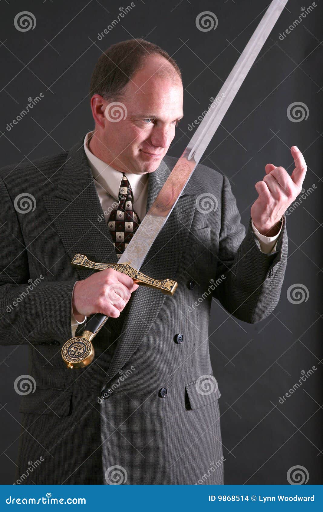 Man in a Suit with a Sword Motioning Come Here Stock Photo - Image of ...