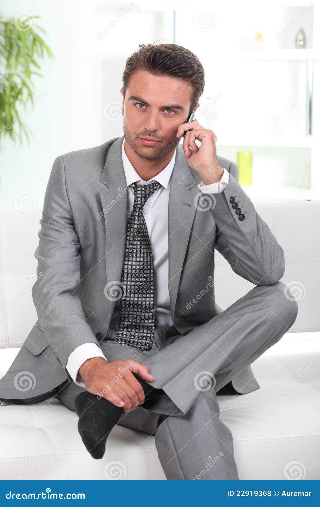 Man in a Suit Talking on Cellphone Stock Photo - Image of dressed ... Man in a Suit Talking on Cellphone Stock Photo - Image of dressed ...