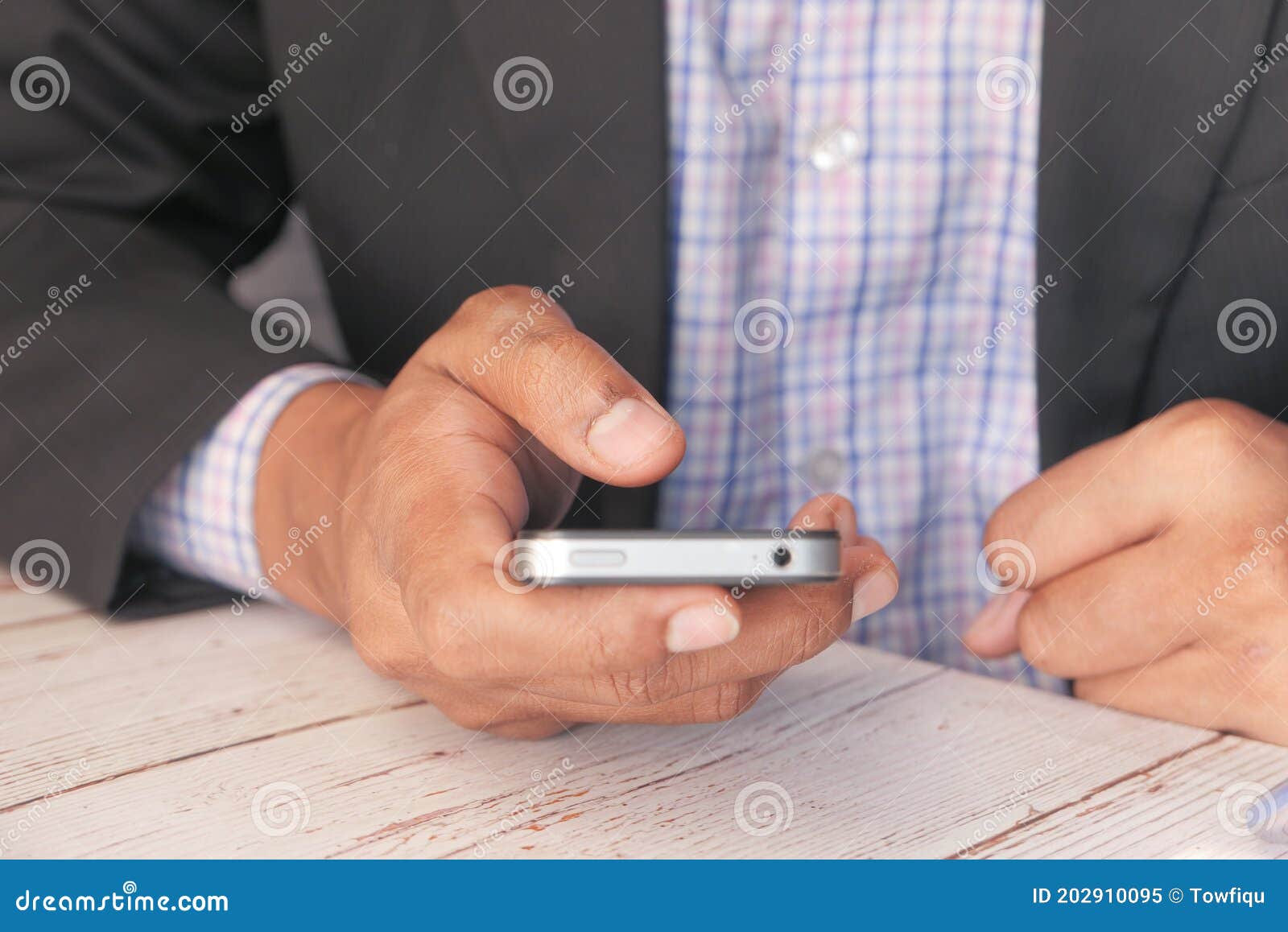 Man in Suit Using Smart Phone on Office Desk Stock Image - Image of ...