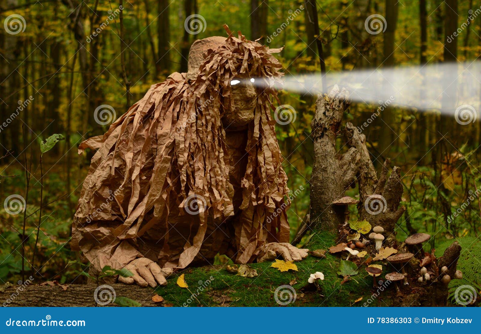 Wood Goblin With A Tree In Hands On A Black Background Royalty-Free ...