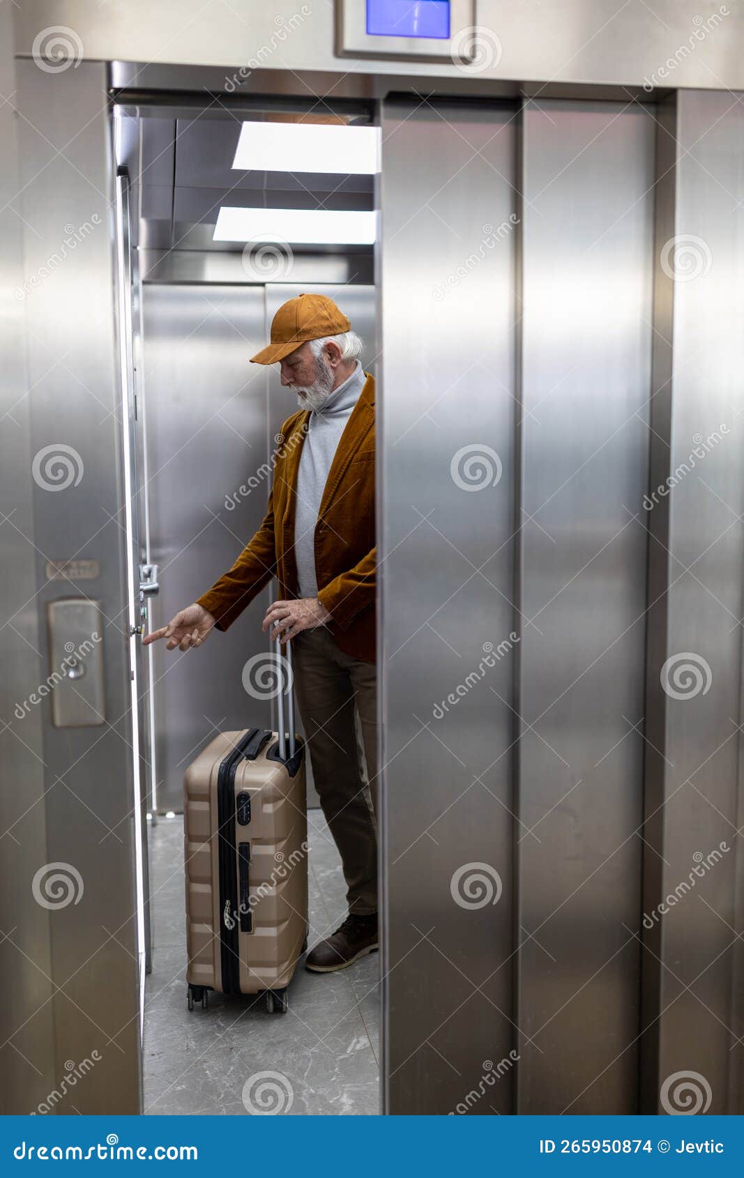 Man with Suitcase Using Elevator on Train Station Stock Photo - Image ...