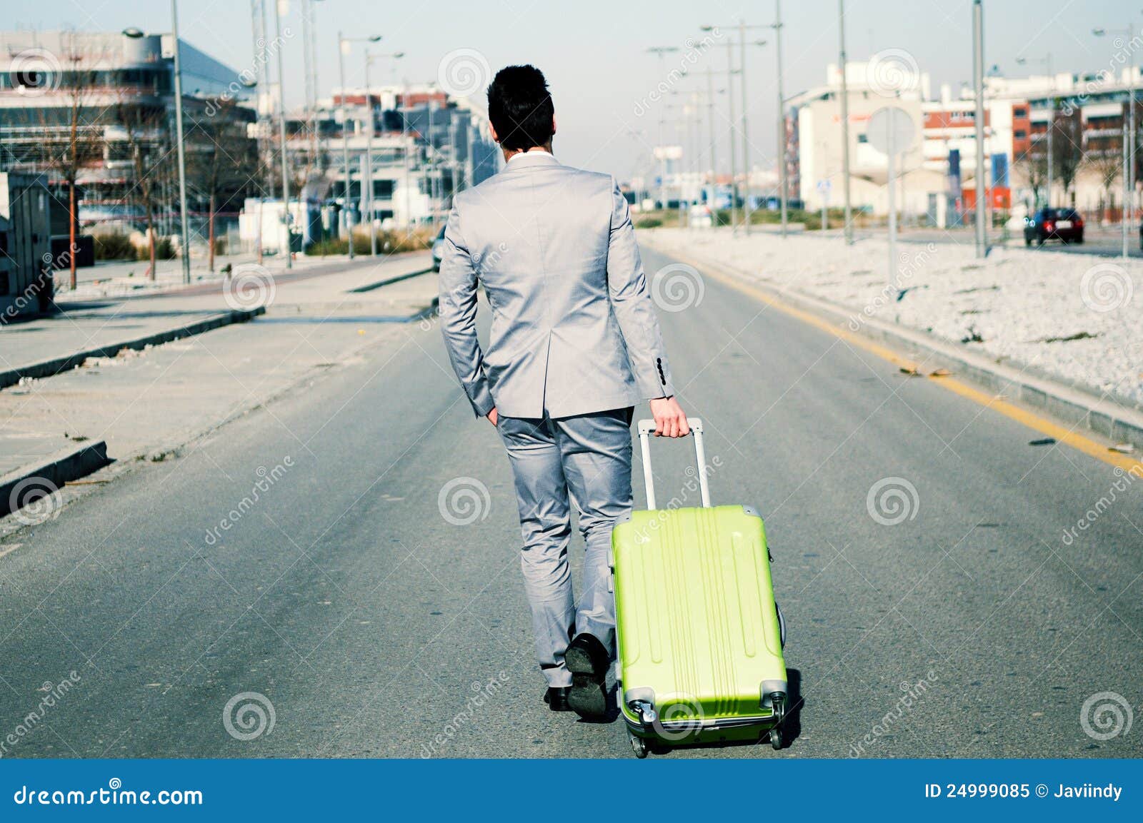 Man with Suitcase Walking Along the Street Stock Image - Image of ...