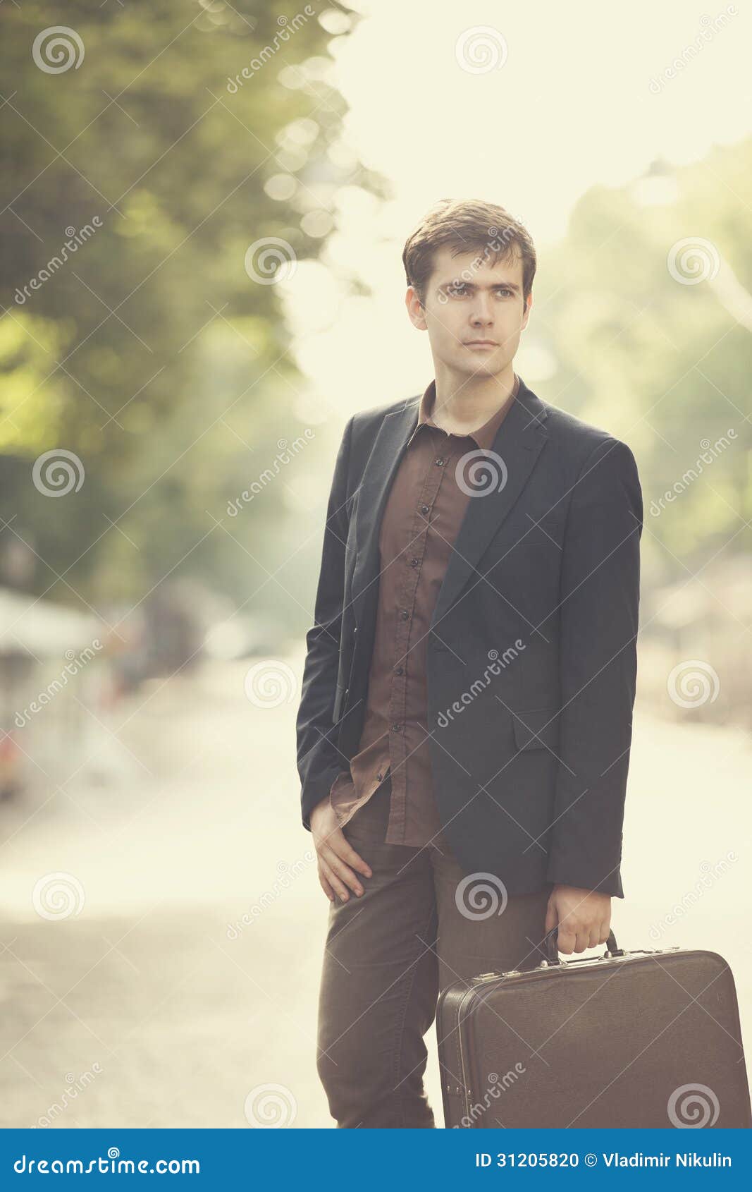 Man with suitcase stock photo. Image of toned, handsome - 31205820