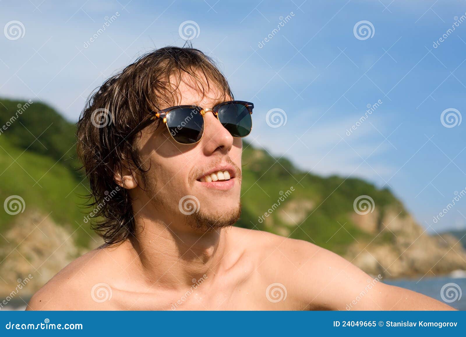 Man sunbathing on beach stock image. Image of cheerful - 24049665