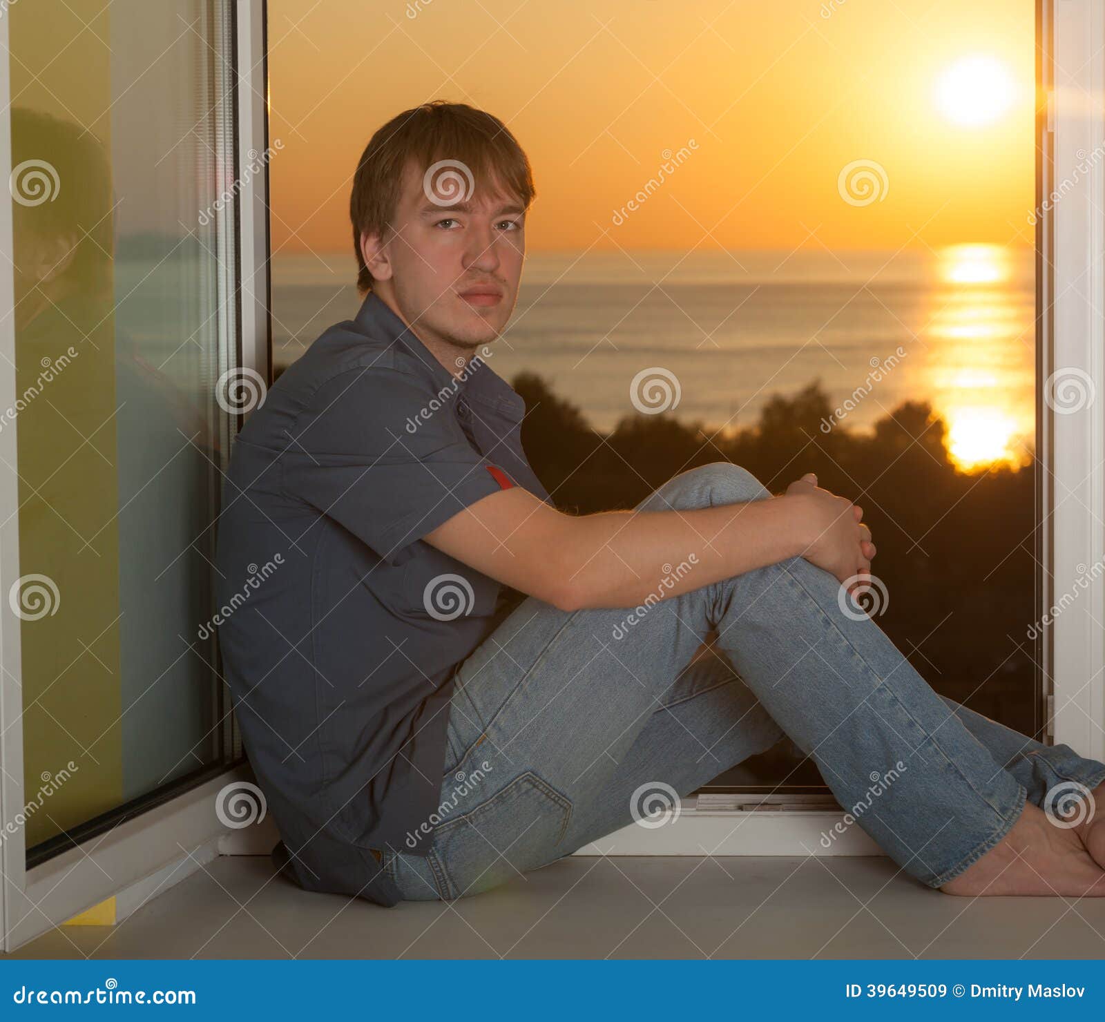 Man at sunset stock image. Image of water, pensive, outdoors - 39649509