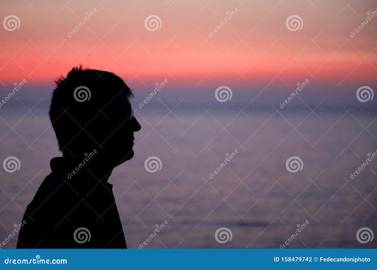 Man at sunset stock photo. Image of sunset, ocean, caucasian - 158479742