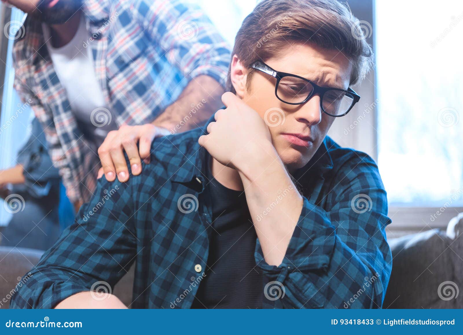 Man supporting his friend stock image. Image of interior - 93418433