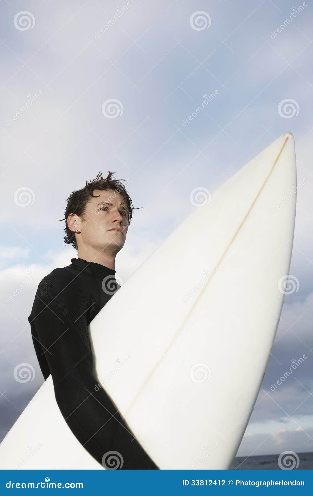 Man with Surfboard Standing on Beach Stock Photo - Image of ...