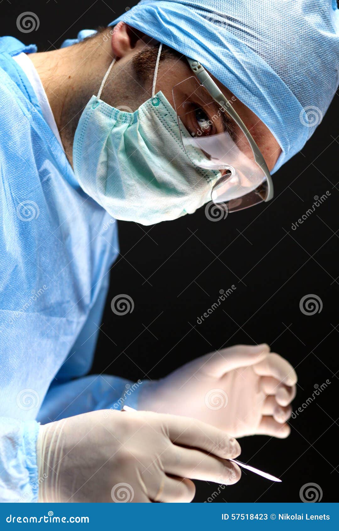 Man Surgeon Holds a Scalpel in an Operating Room Stock Image - Image of ...