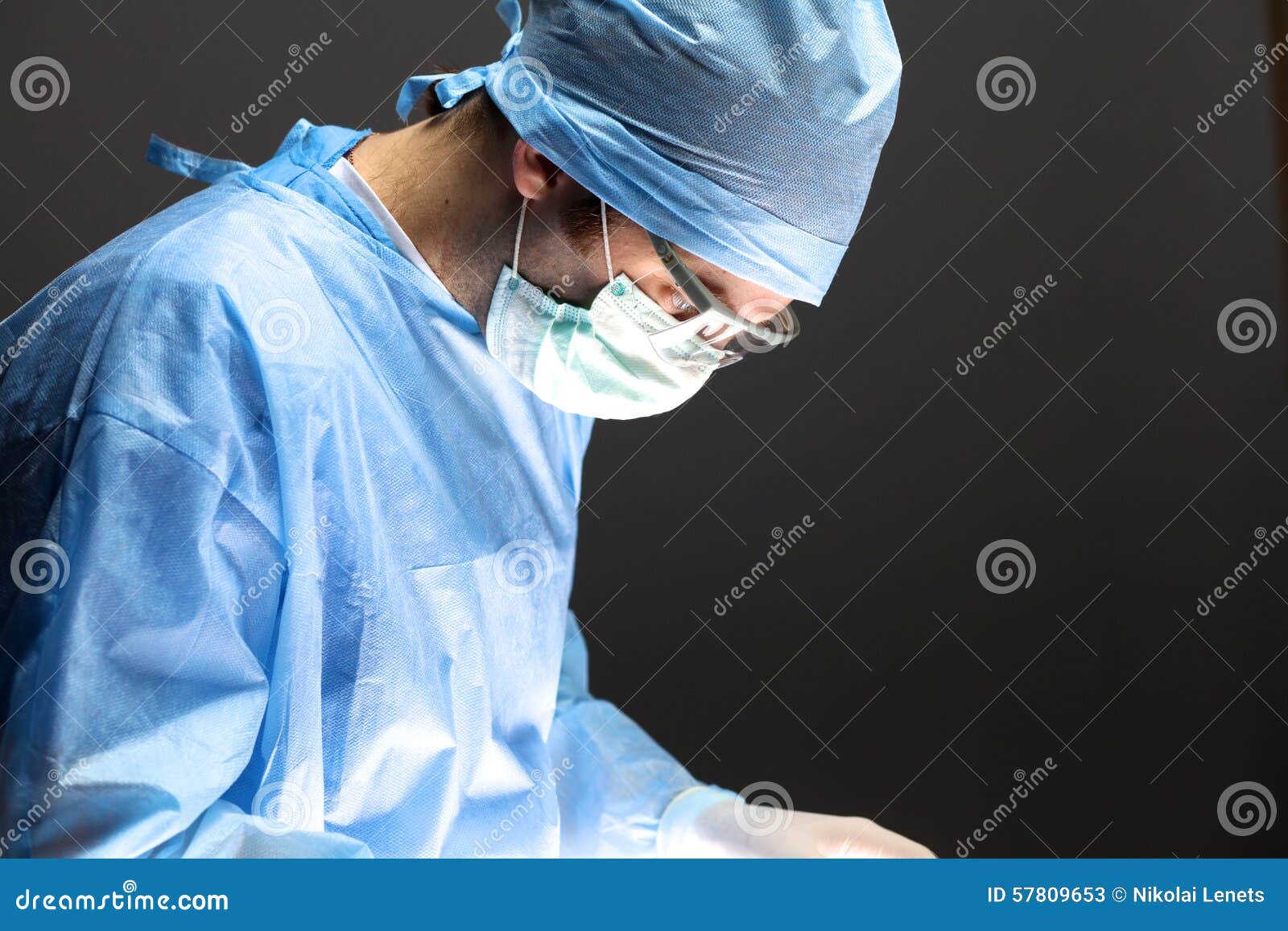 Man Surgeon Holds a Scalpel in an Operating Room Stock Image - Image of ...