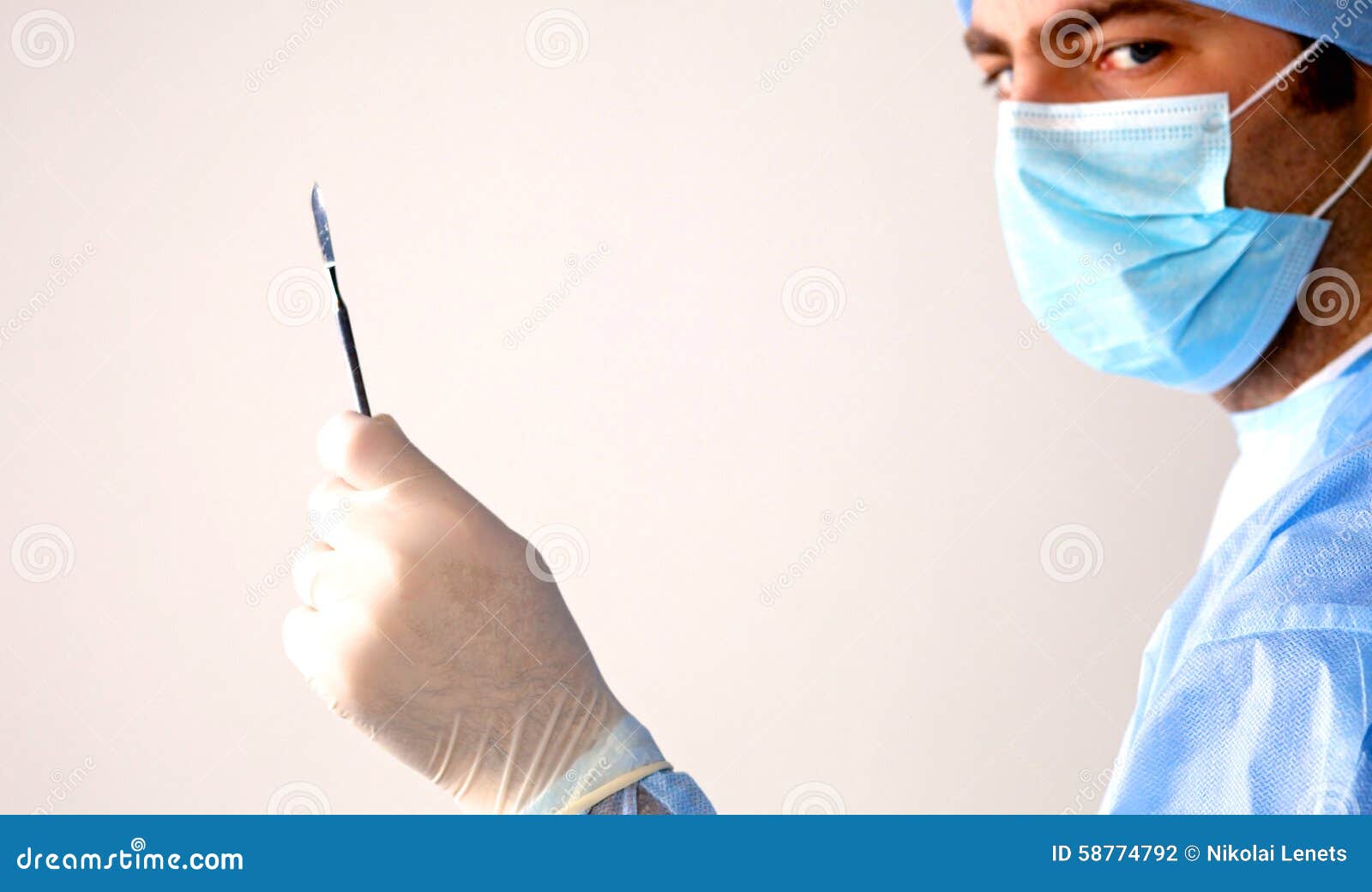 Man Surgeon Holds a Scalpel in an Operating Room Stock Photo - Image of ...