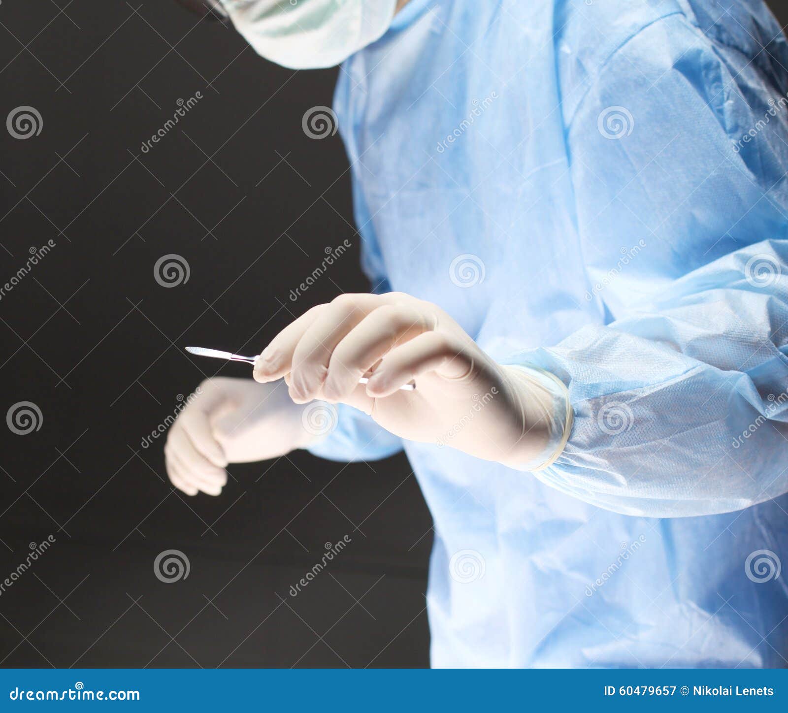 Man Surgeon Holds a Scalpel in an Operating Room Stock Image - Image of ...