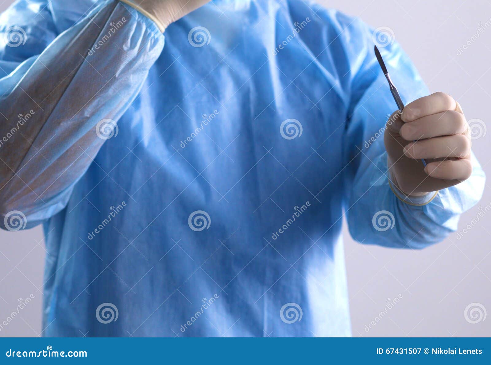 Man Surgeon Holds a Scalpel in an Operating Room Stock Image - Image of ...