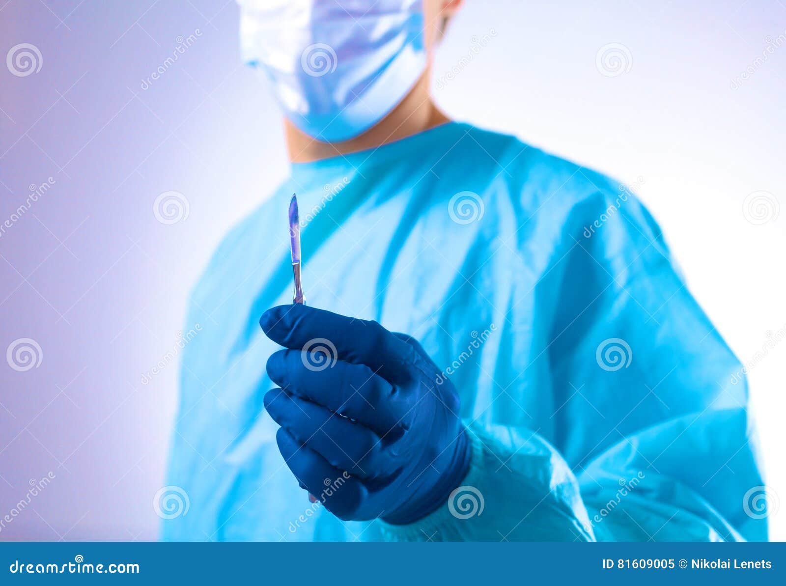 Man Surgeon Holds a Scalpel in an Operating Room Stock Image - Image of ...