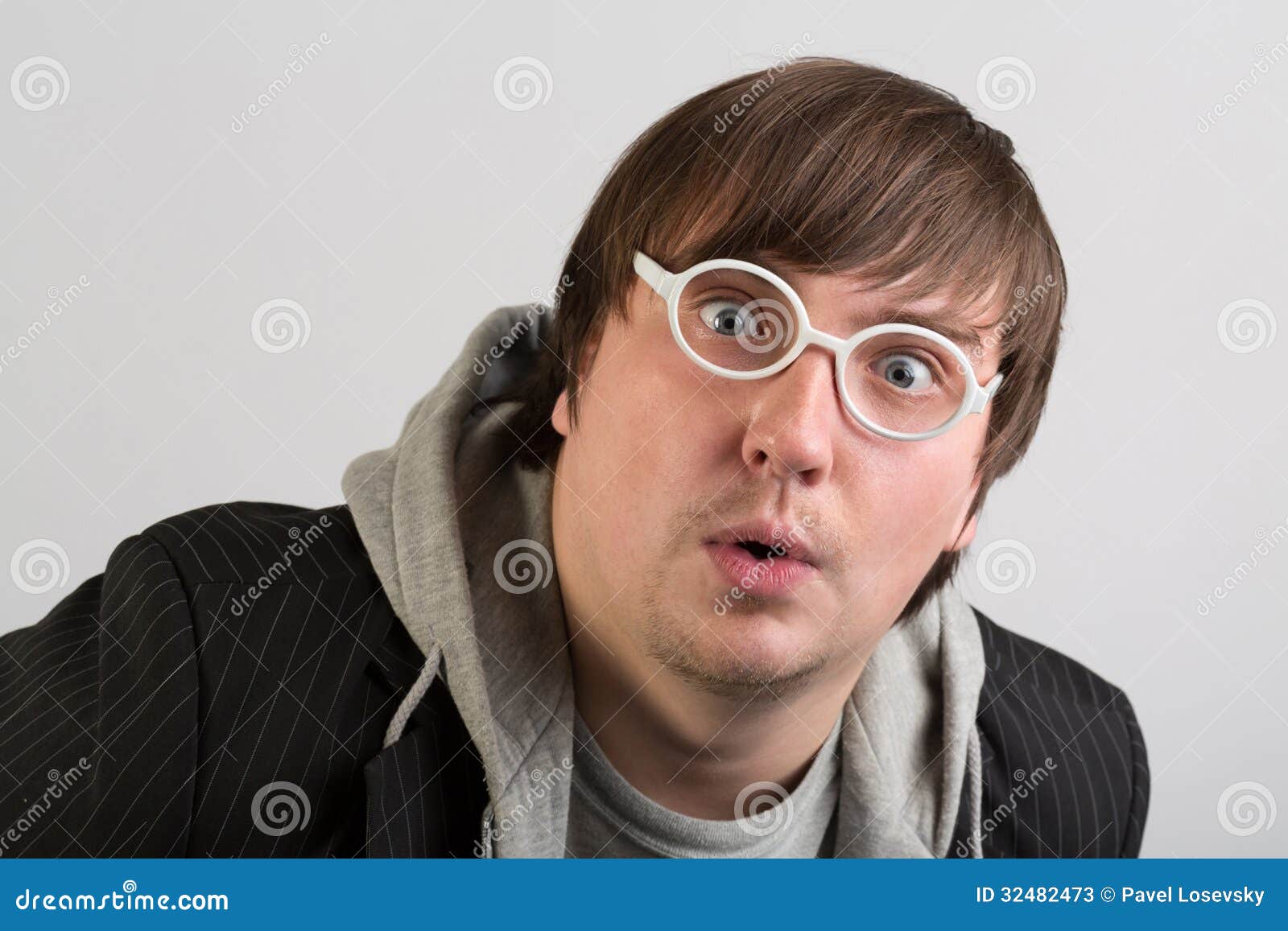 Surprised Face Man Making Number Hand Sign On Isolated White Background ...