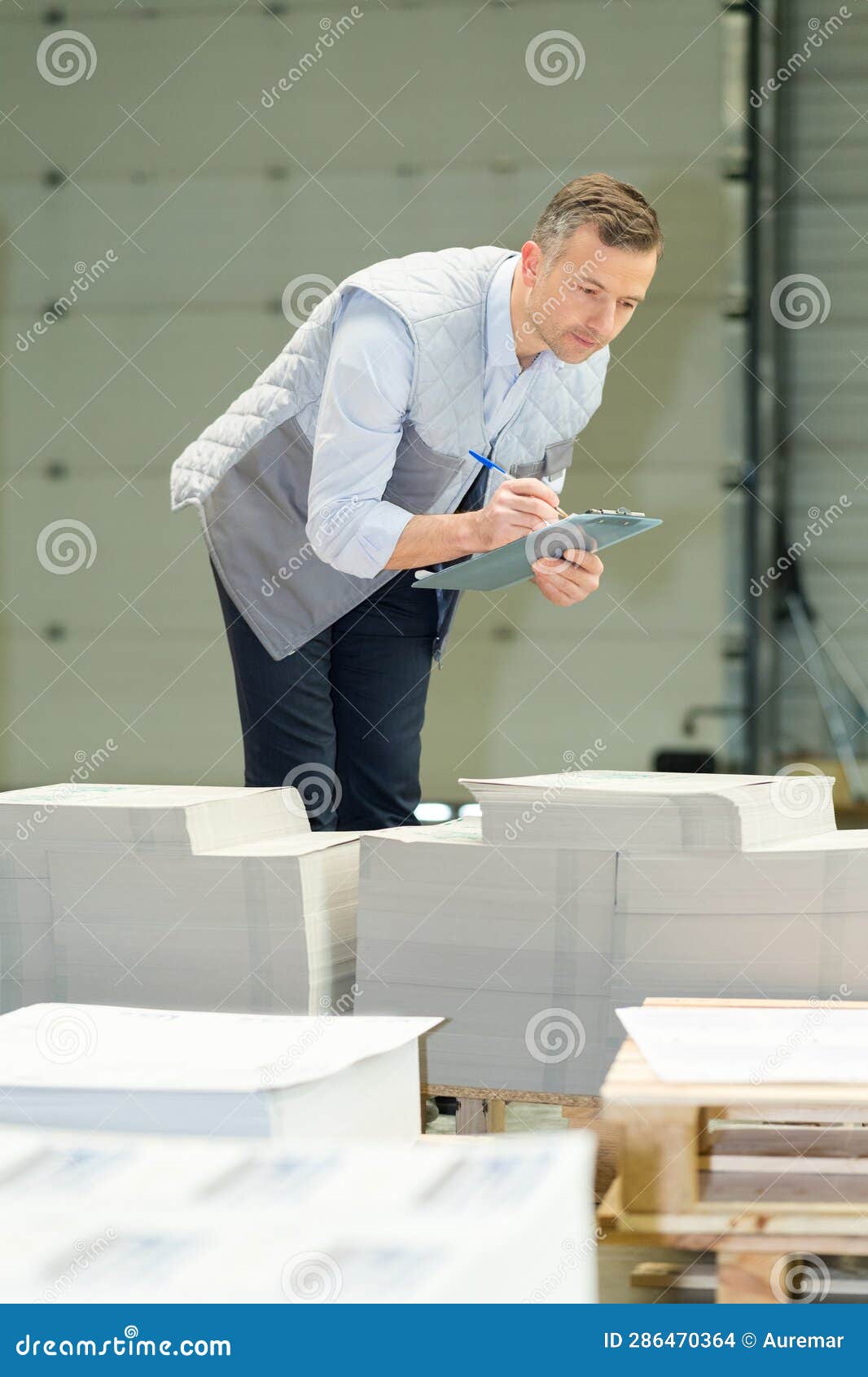 Man Surrounded by Stacks Boxes Stock Photo - Image of standing ...