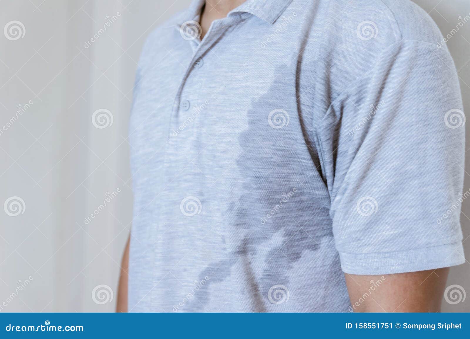 Man with Sweat Stain on Clothes Against Stock Image - Image of patch ...